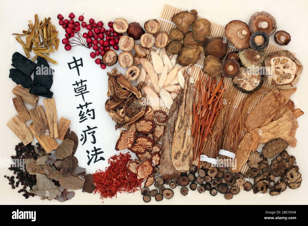 Chinese herbs used in herbal medicine with calligraphy script on rice ...