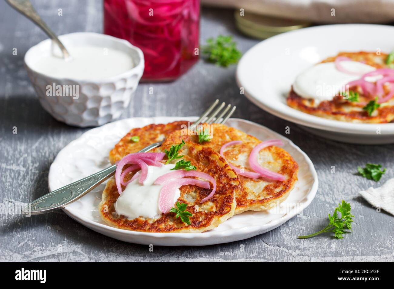 Breakfast made from traditional boxty fritters or latkes served with ...
