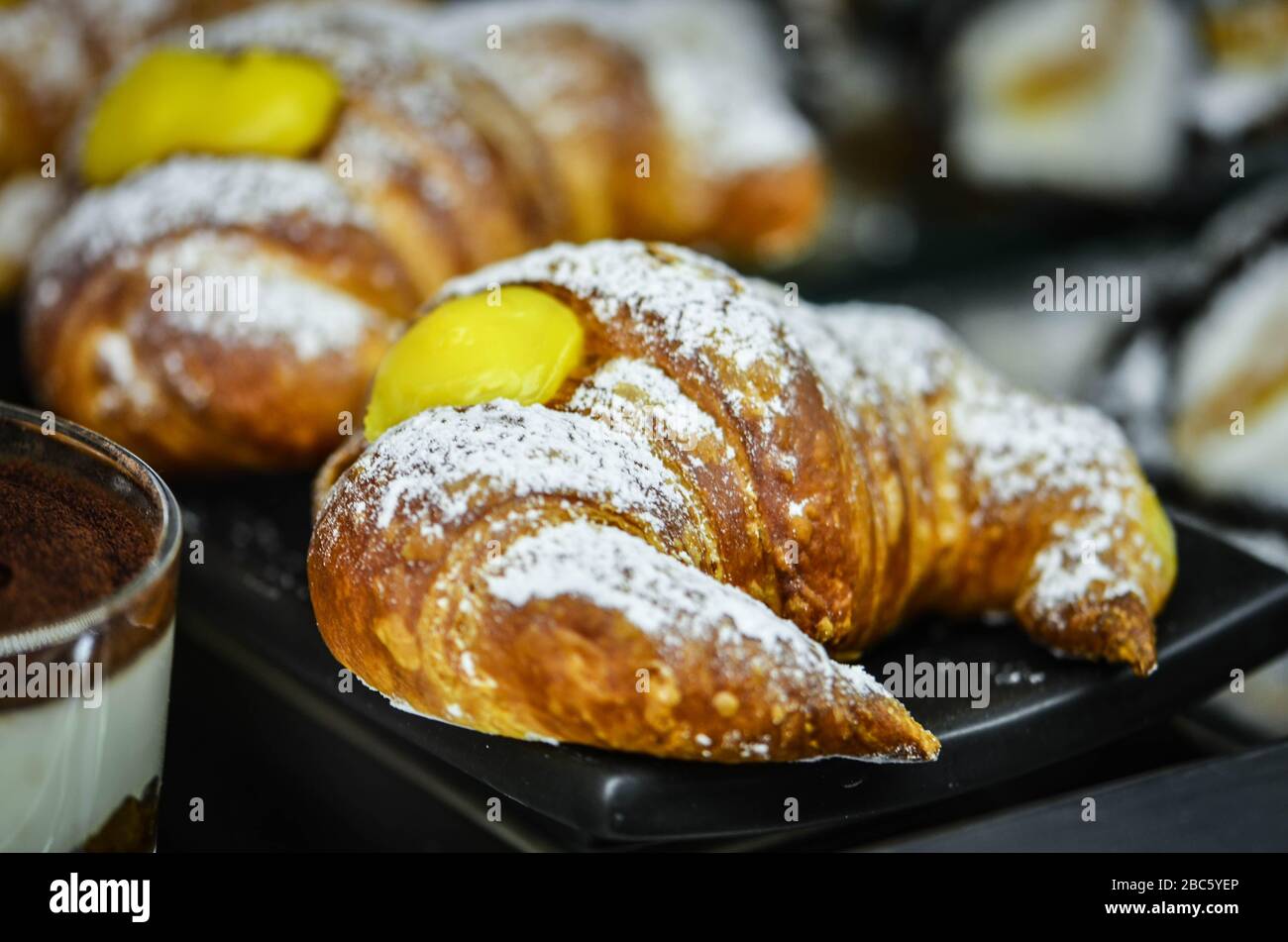 delicious italian pastry & mini cakes Stock Photo - Alamy