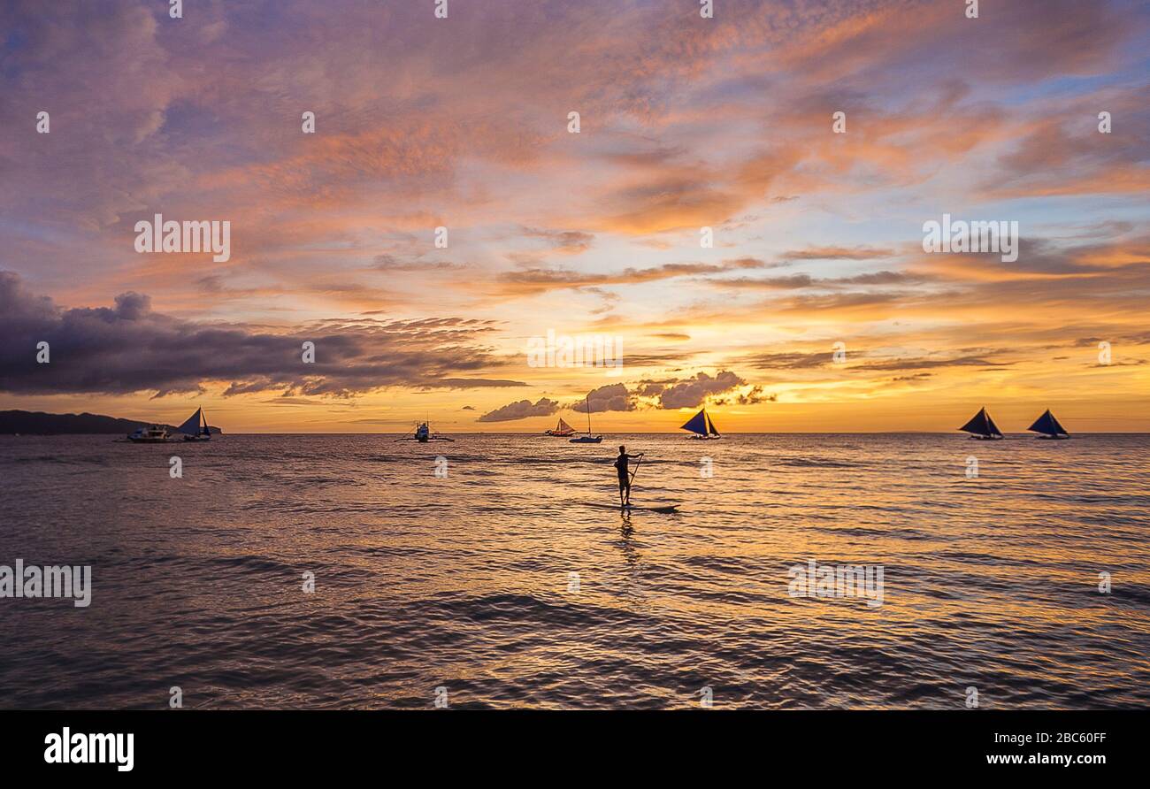 White beach sunset on Boracay island, Philippines Stock Photo - Alamy