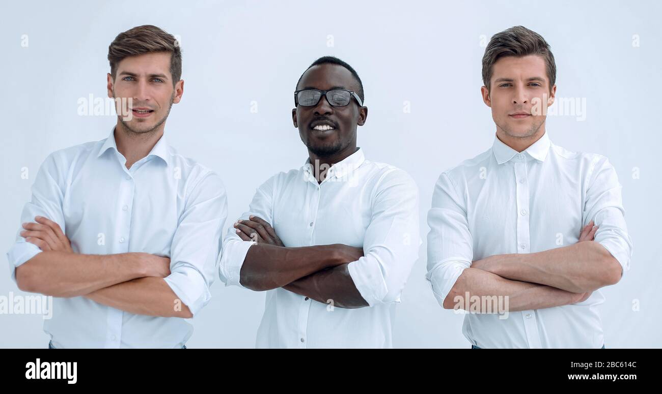 three confident business men standing together Stock Photo - Alamy