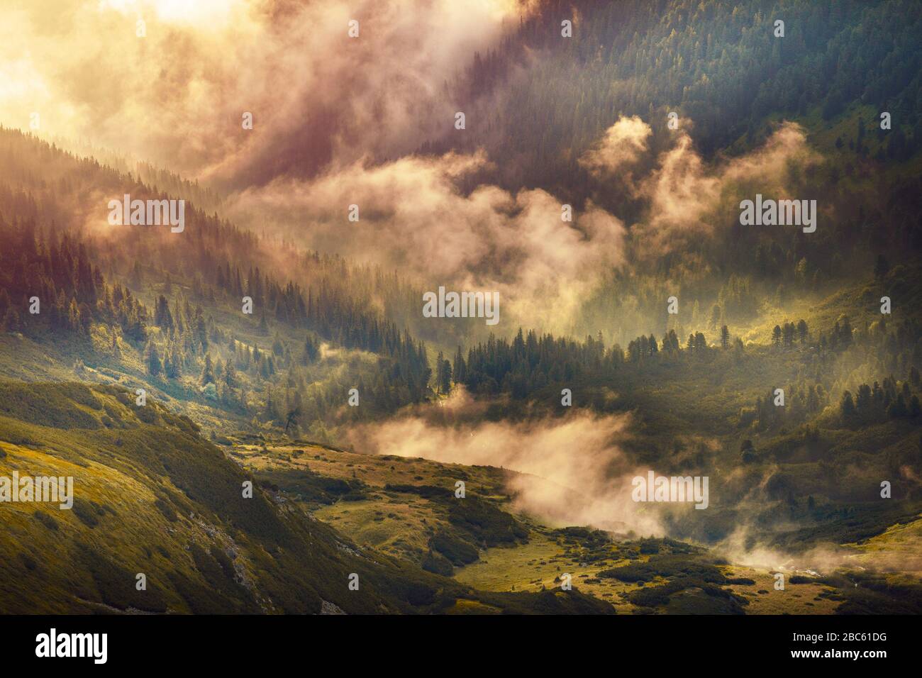 Mist rolling over peaks hi-res stock photography and images - Alamy