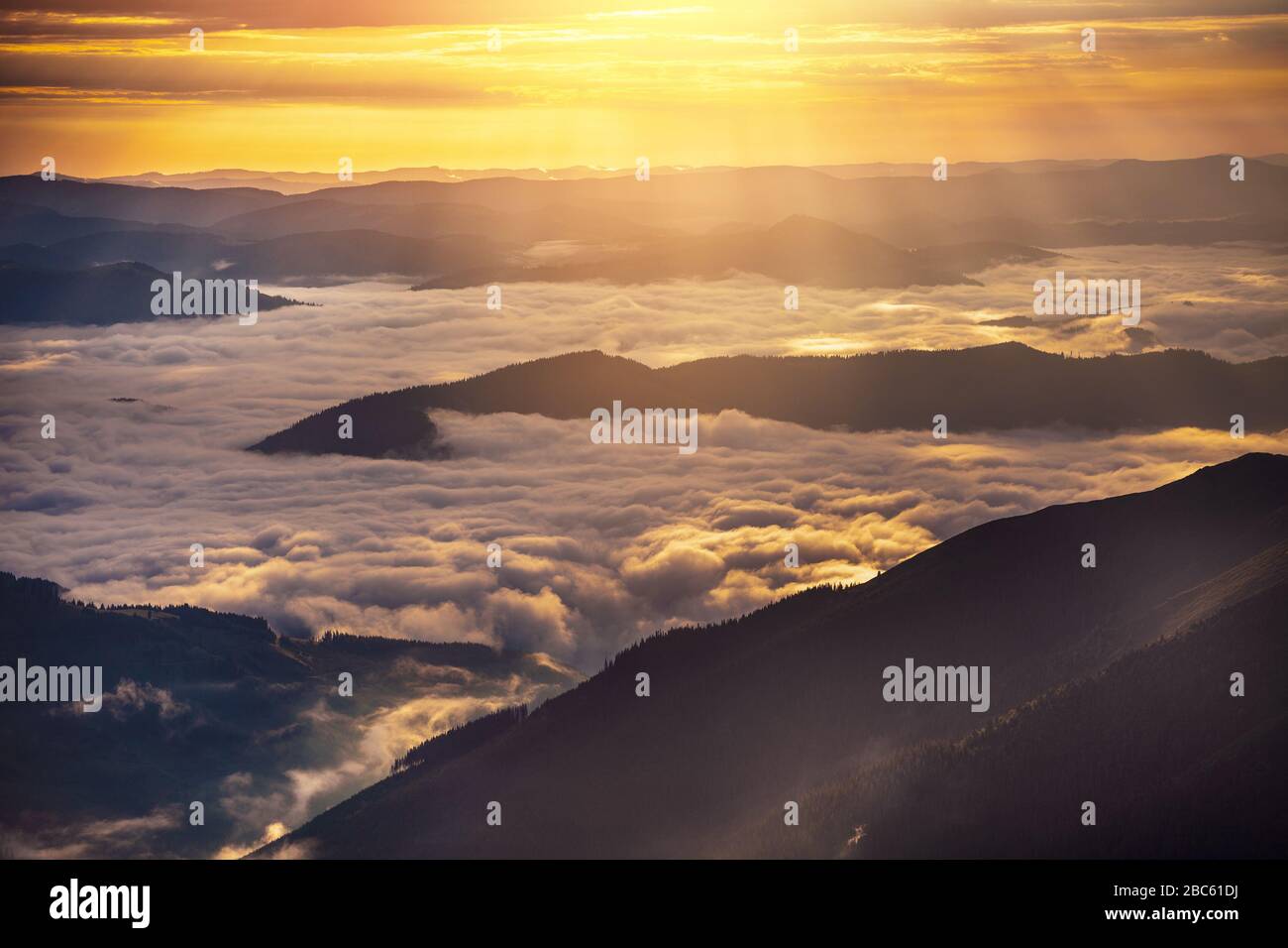 Mist rolling over peaks hi-res stock photography and images - Alamy