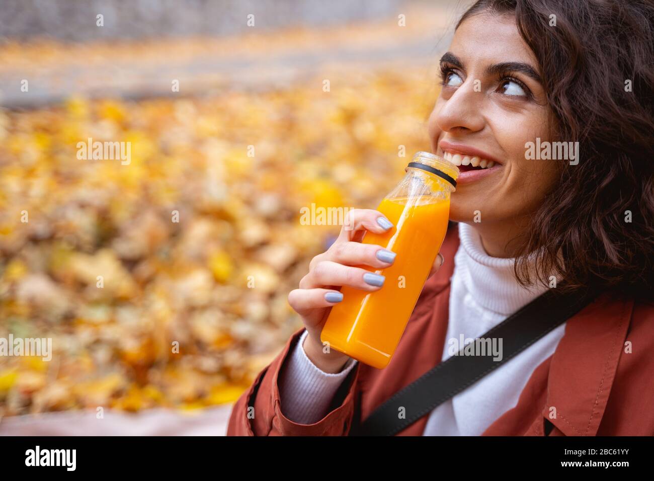 Feeling excited while drinking tasty juice stock photo Stock Photo - Alamy