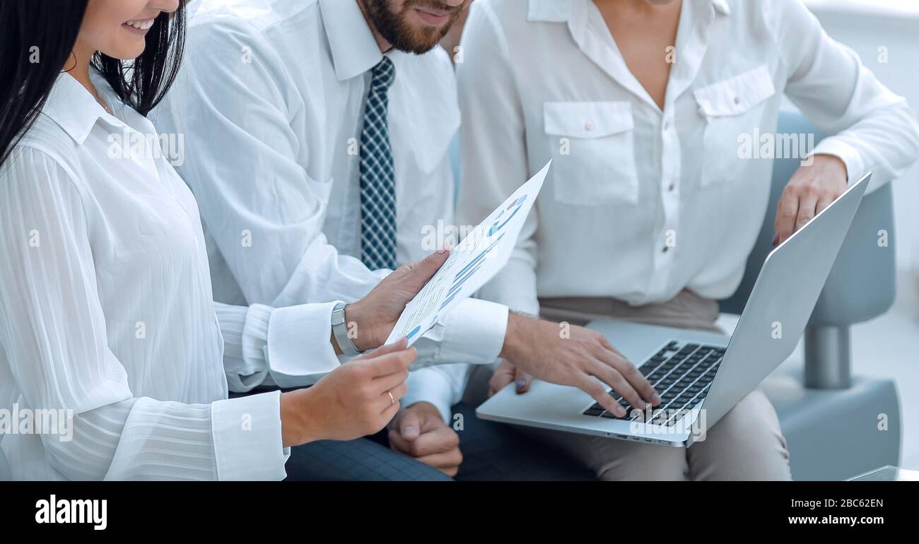 business team working with financial charts in the office Stock Photo ...