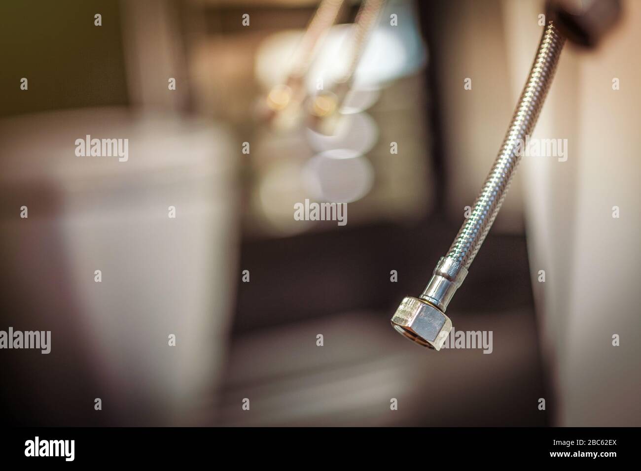 Plumbing metal water hoses pipes Stock Photo - Alamy