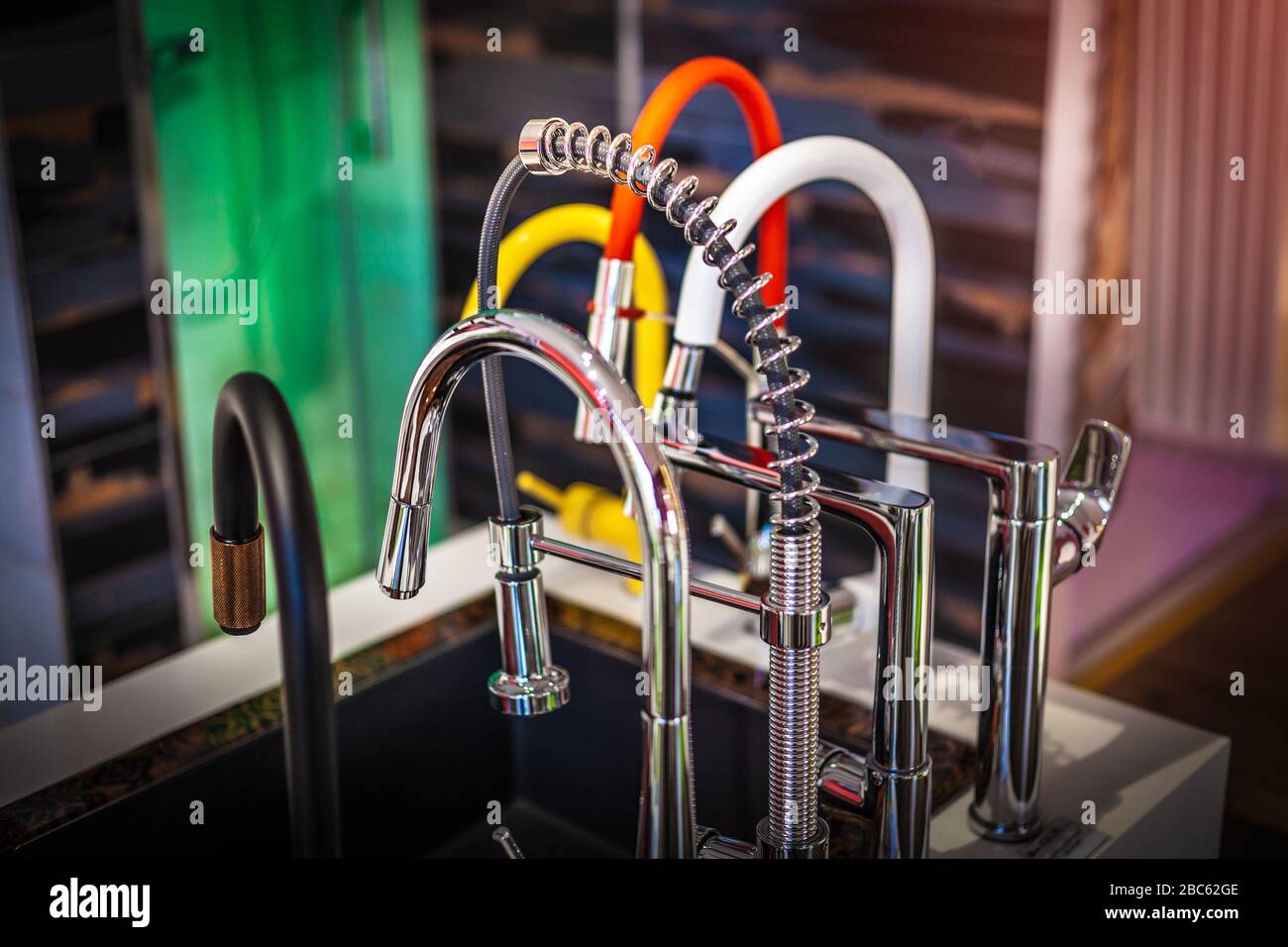 Multiple water taps in plumbing or hardware store showroom Stock Photo ...