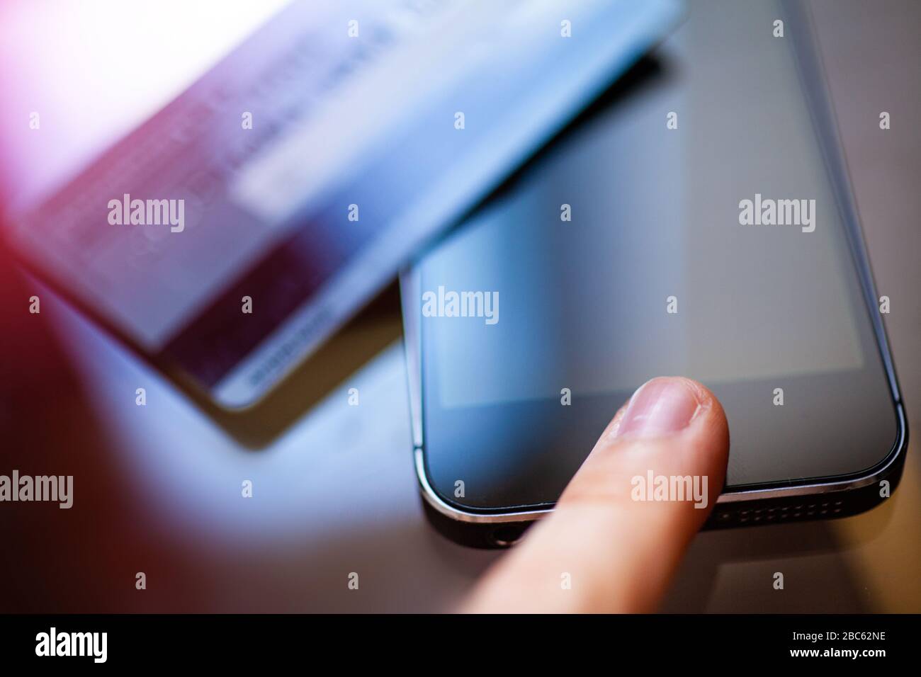 Mobile banking or online shopping concept, smartphone and credit or ...