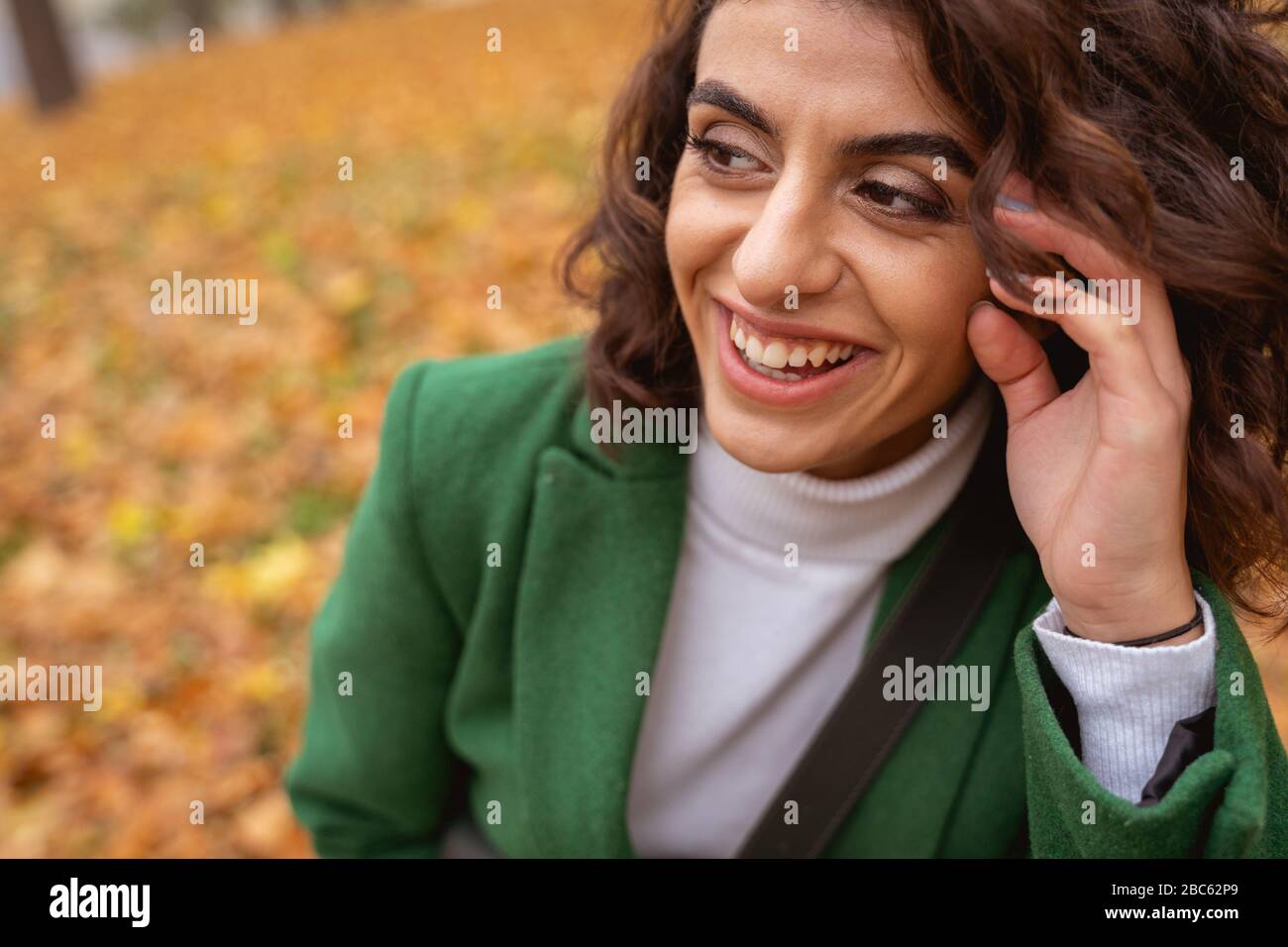 Portrait of happy lady laughing outdoors stock photo Stock Photo - Alamy