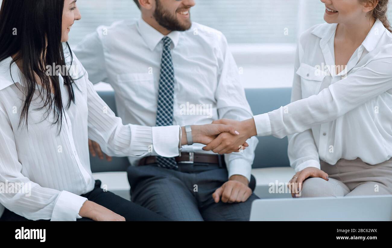 handshake of manager and client in the office lobby Stock Photo - Alamy