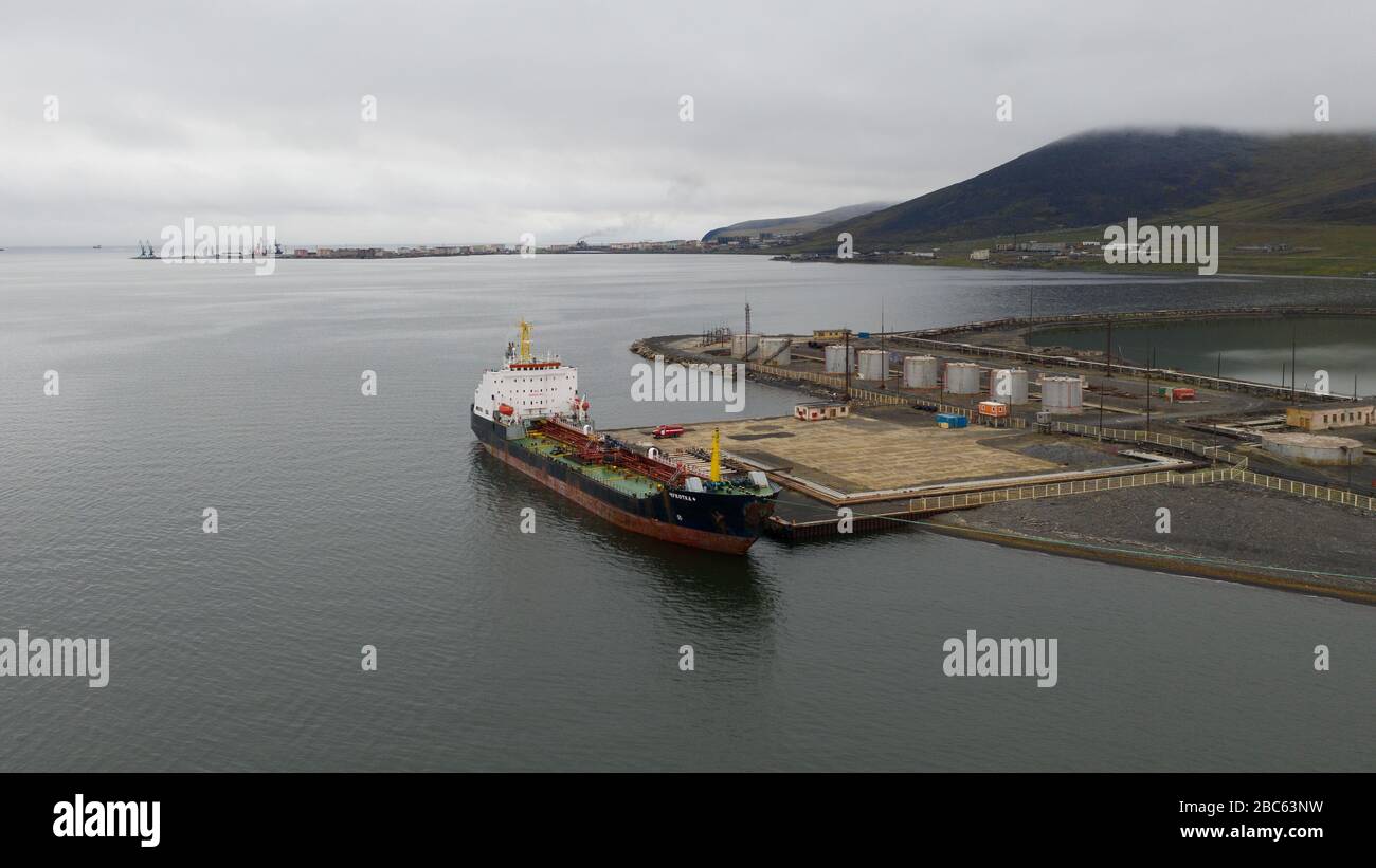 Pevek, Russia - August 2, 2019: The Chukotka+ tanker at the sea mooring ...