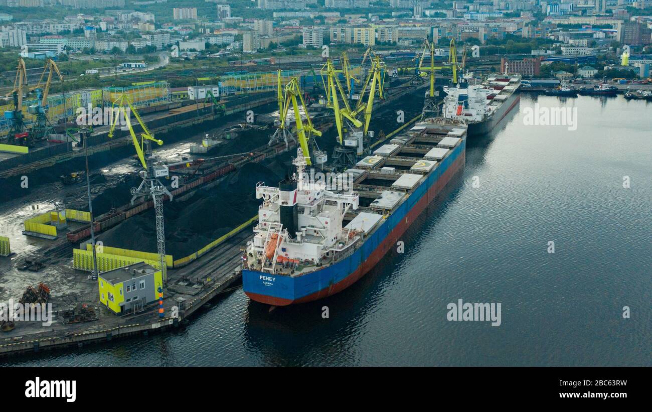 Murmansk, Russia - August 18, 2019: Vessels at the mooring of the coal ...