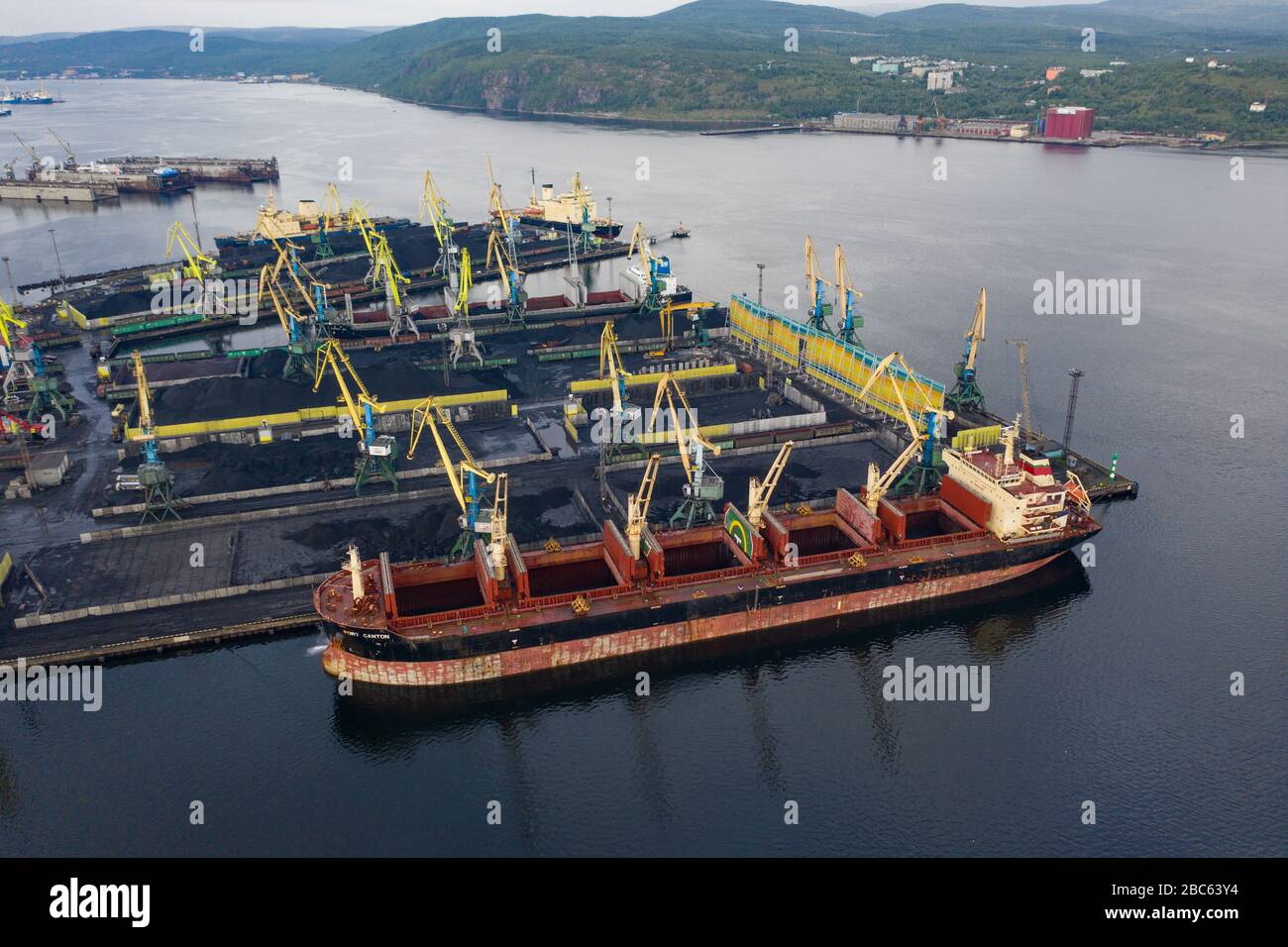 Murmansk, Russia - August 18, 2019: Vessels at the mooring of the coal ...