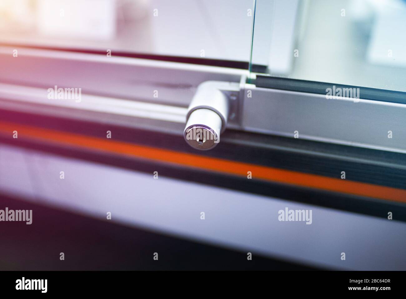 Shop secured glass window shelf with anti theft locks Stock Photo - Alamy