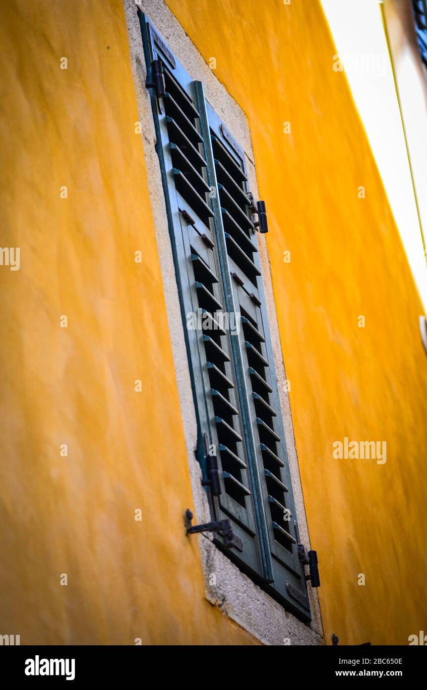 close up view of the historical buildings of Trieste - old windows, old ...