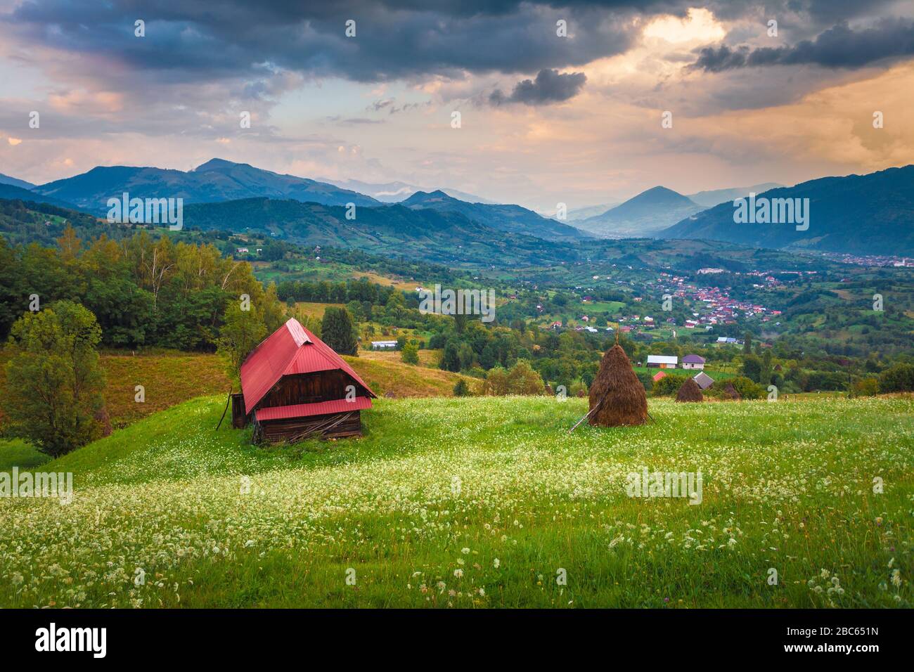 Beautiful small cabin on the hills in Romania Stock Photo - Alamy