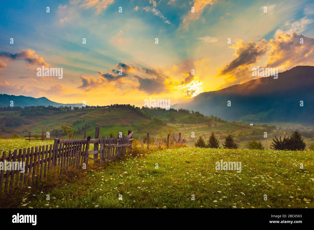 Simple sunrise landscape on the hills Stock Photo - Alamy