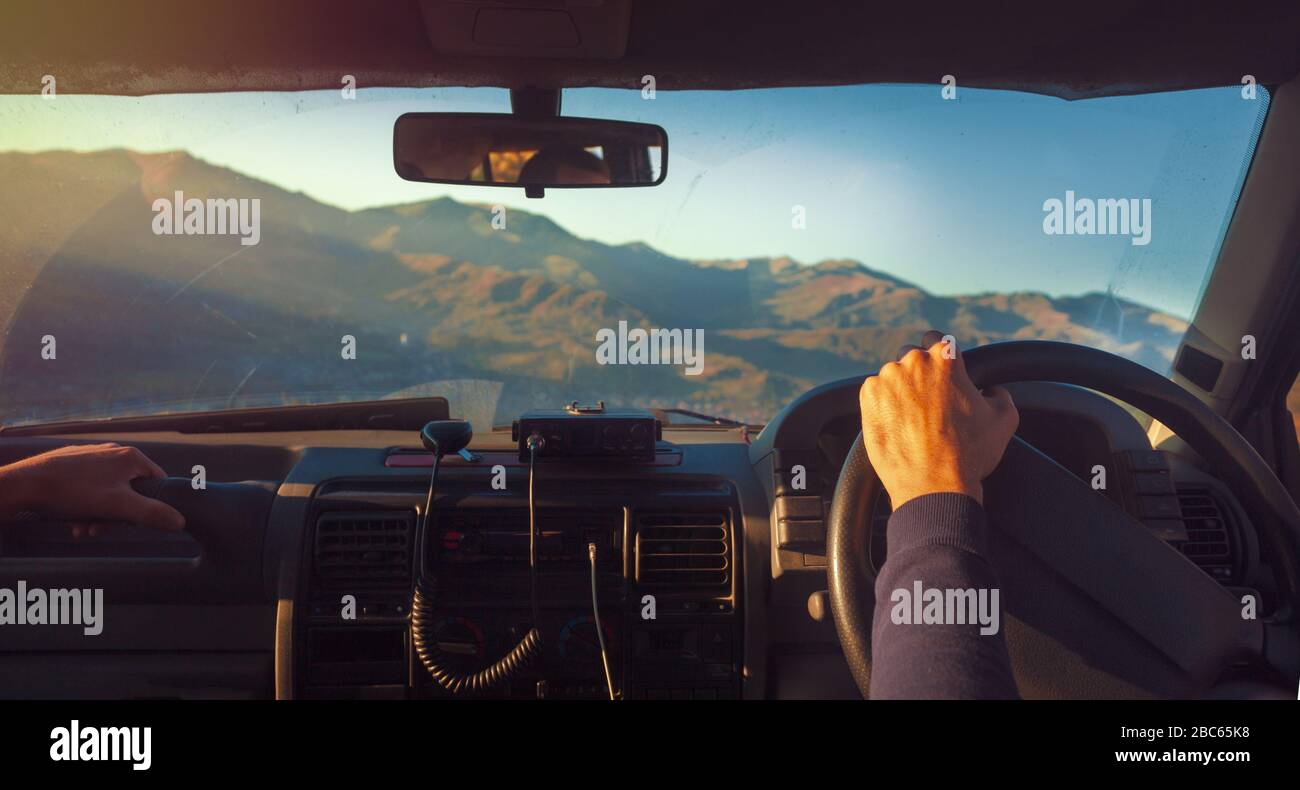 Off-road driving, view from inside the car through the windshield Stock ...
