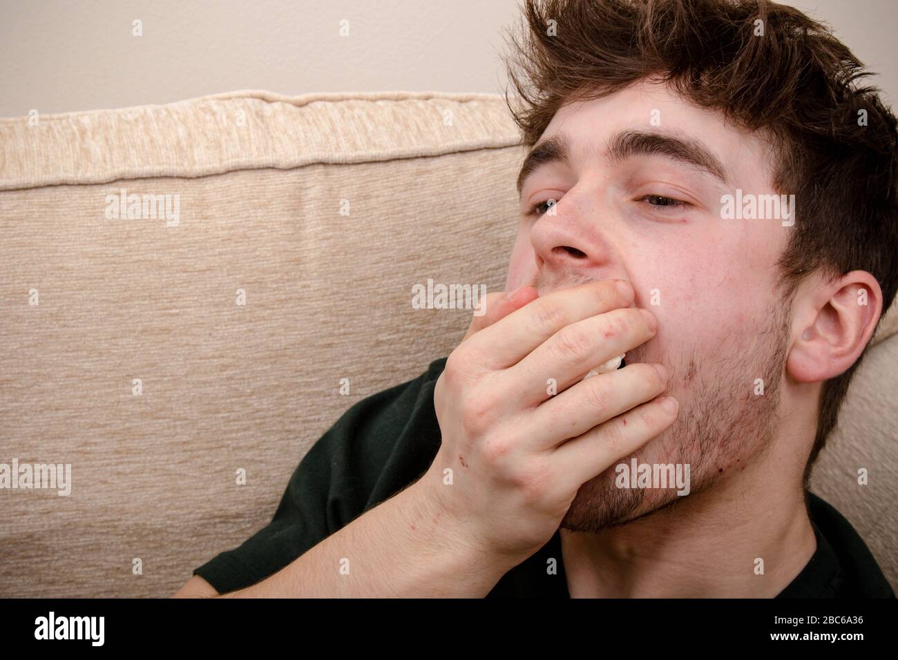 Man laying on lounge chair hi-res stock photography and images - Alamy