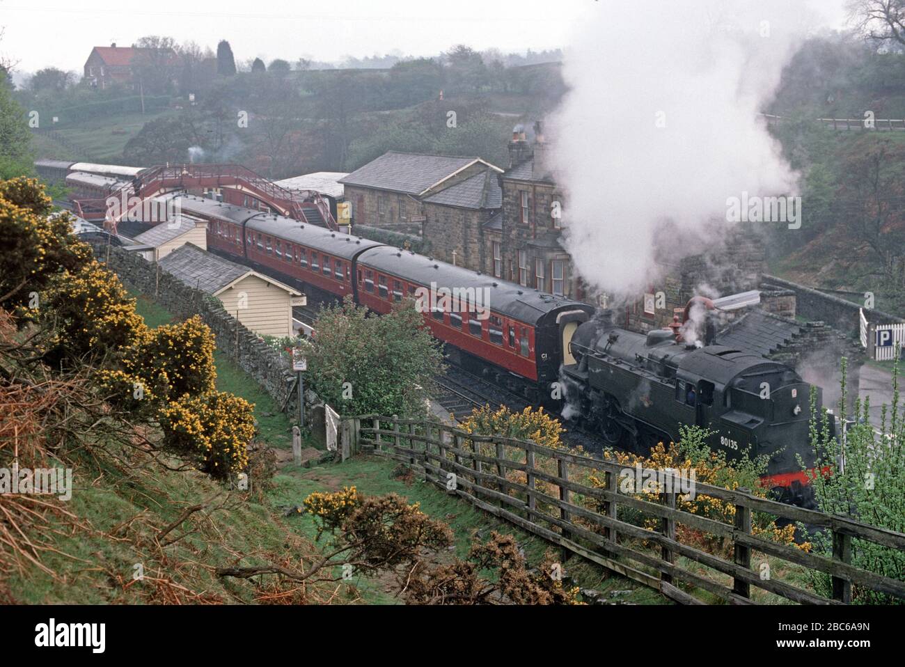 Steam train collecting passengers at Goathland station on the North ...