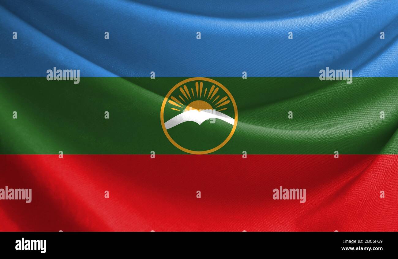 Realistic flag of Karachay Cherkessia on the wavy surface of fabric ...