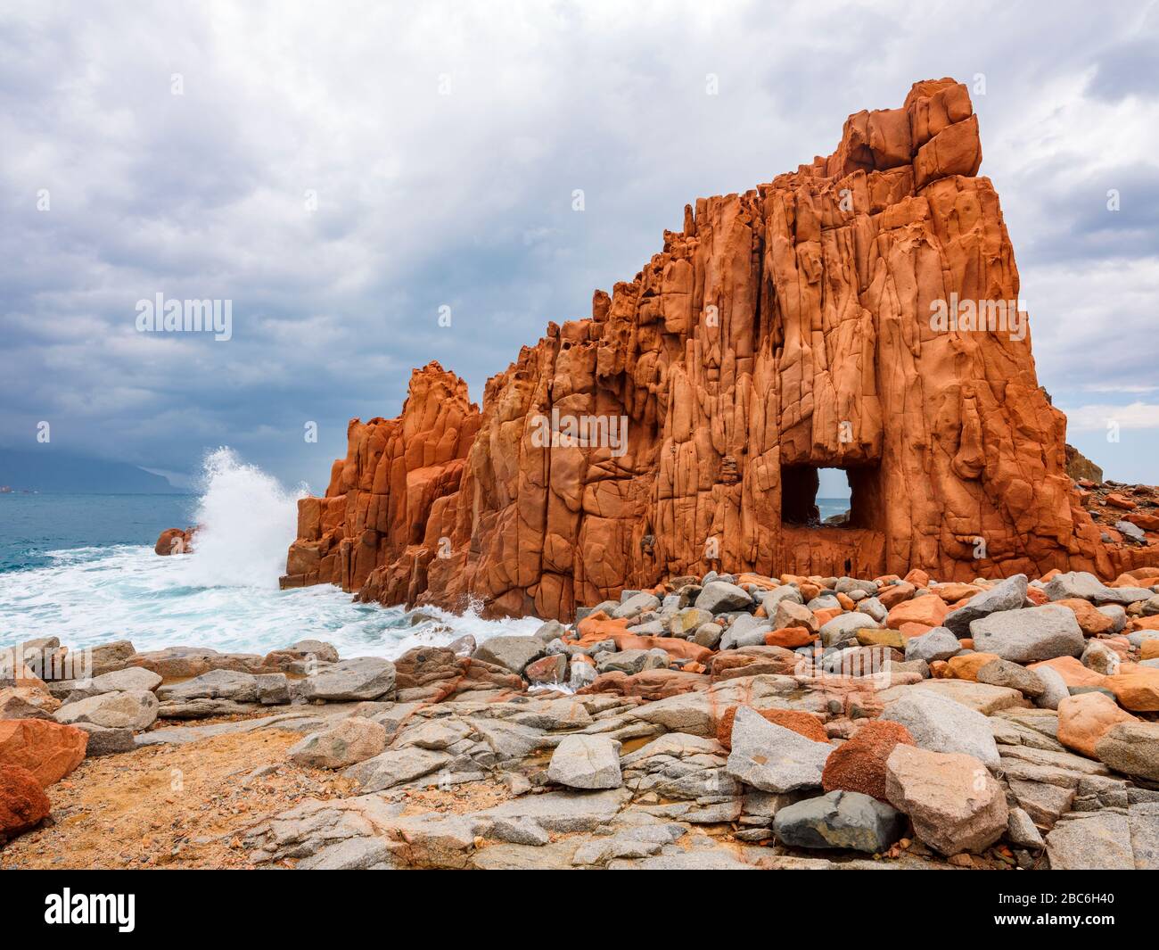 The silhouette of the famous porphyritic reef known as “red rocks" from ...