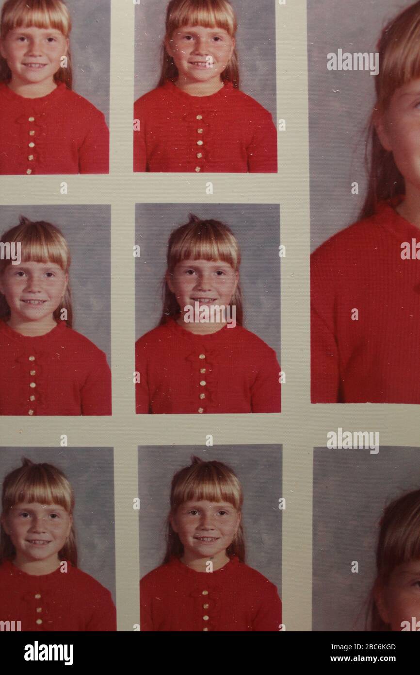 Formal grade school portrait of a beautiful young caucasian girl with ...