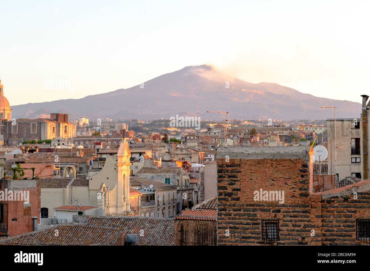 Catania, Sicily in Italy. Aerial view of the city roofs at sunset with ...