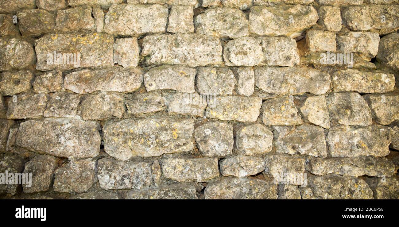 Material construction background of old vintage stones brick wall ...