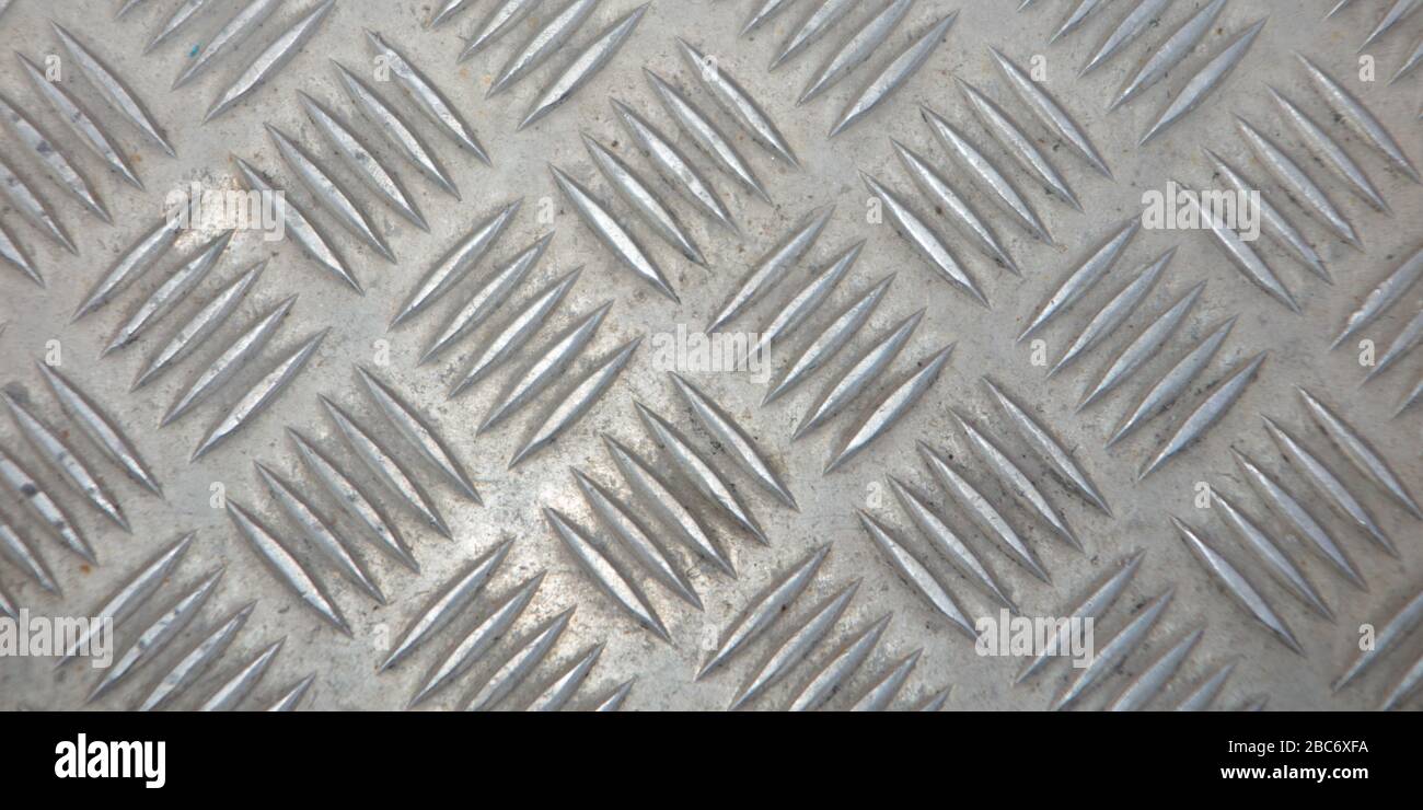 gray colored diamond plate metal Sheet Background texture shiny silver ...