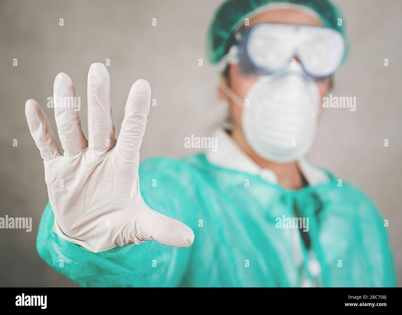 Stop coronavirus.foreground of Medical worker doctor showing a stop ...