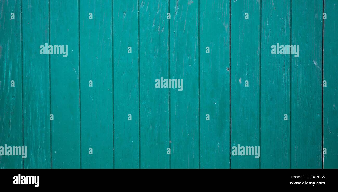 green wooden slats background vertical planks wood Stock Photo - Alamy