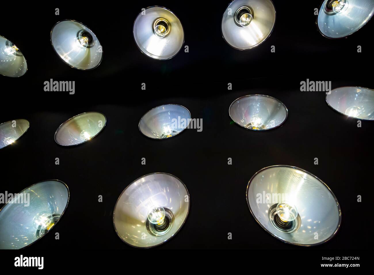 Many luminous spotlights are built into the wall Stock Photo - Alamy