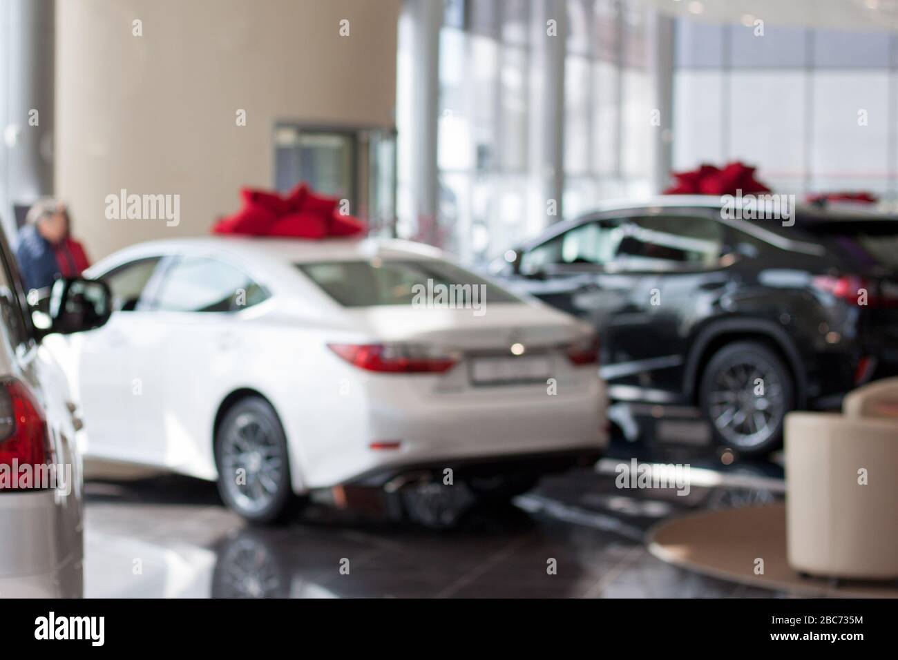 New cars at dealer showroom. For use as a background. Modern and ...