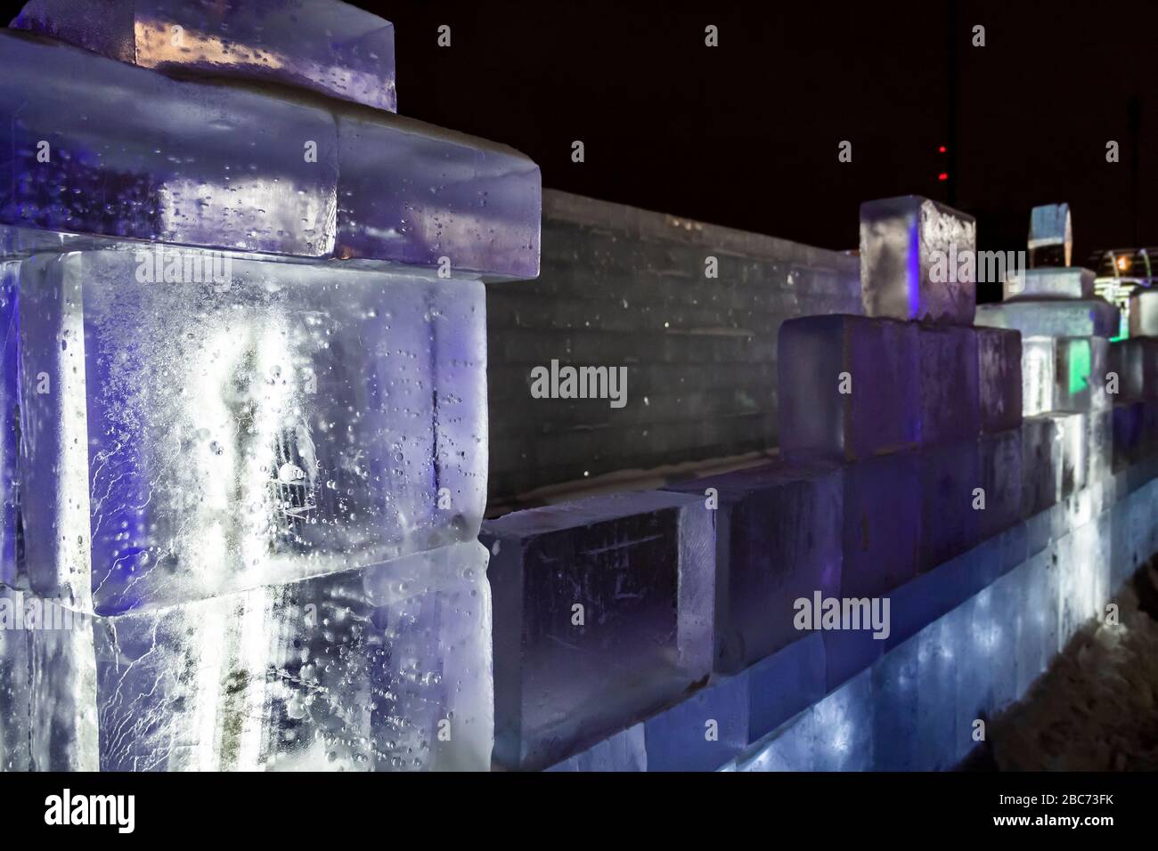 Artificial ice buildings in a city park during the celebration Stock ...