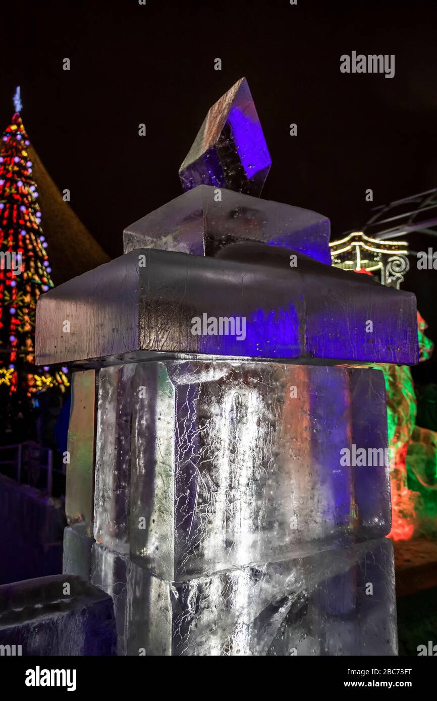 Artificial ice buildings in a city park during the celebration Stock ...