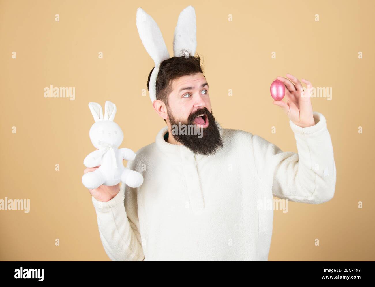 Funny bunny man soft ears. Easter activities concept. Weirdo concept ...