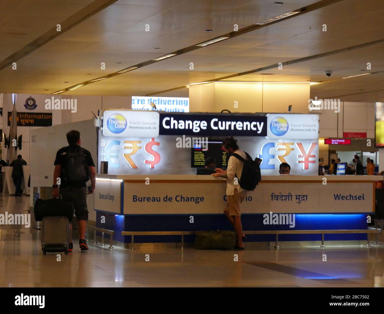 New Delhi, India- March 2018: A man stands at a currency changer outlet ...