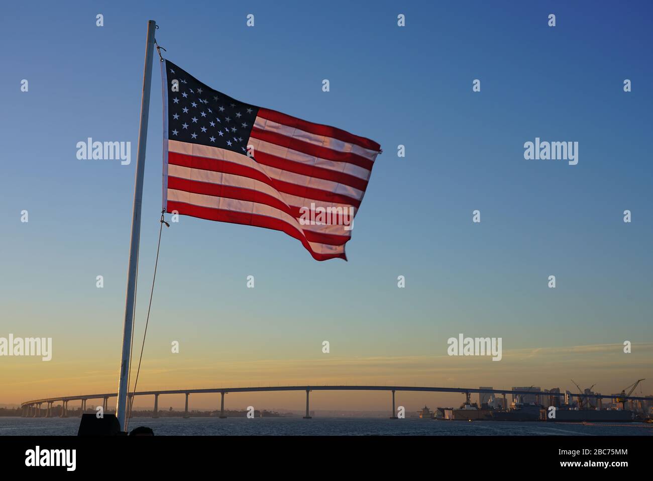 American flag of the United States of America floating in the sky on a ...