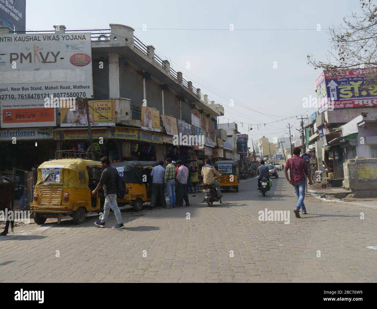 Mathura, Uttar Pradesh, India- March 2018: Street view with rickshaws ...