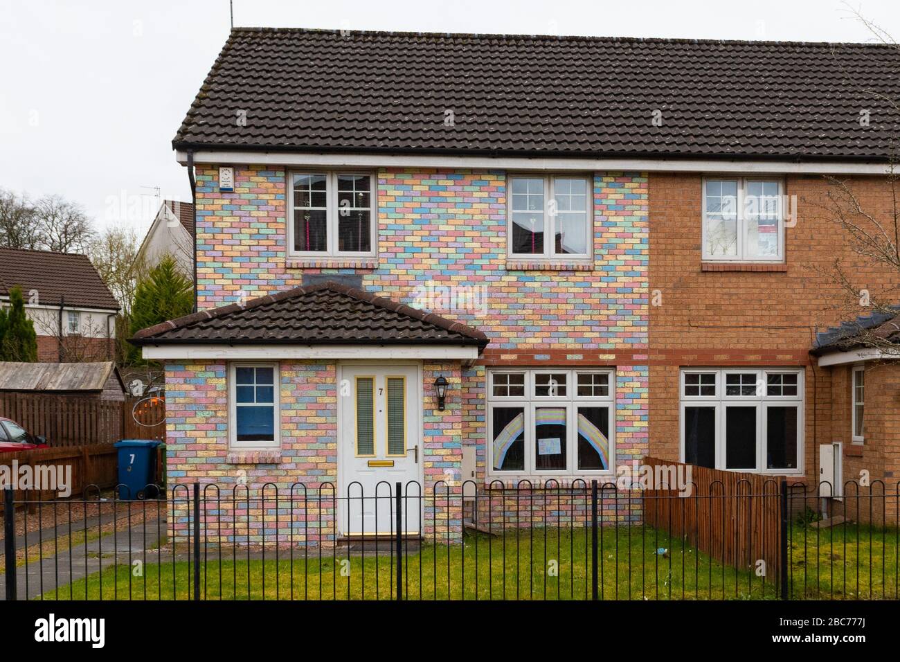 Ruchill, Glasgow, Scotland, UK. 3rd Apr, 2020. A family in Ruchill ...