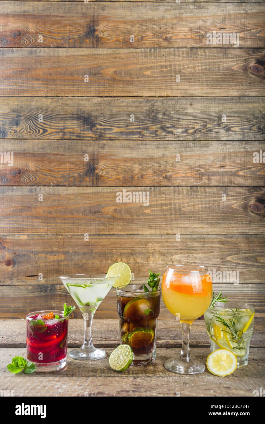 Selection of summer alcohol drinks - mocktails and cocktails. Aperol ...