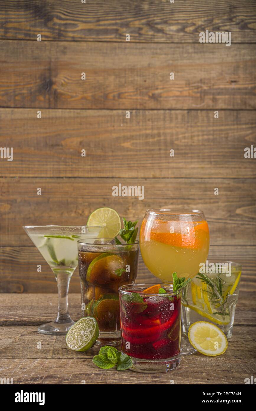 Selection of summer alcohol drinks - mocktails and cocktails. Aperol ...