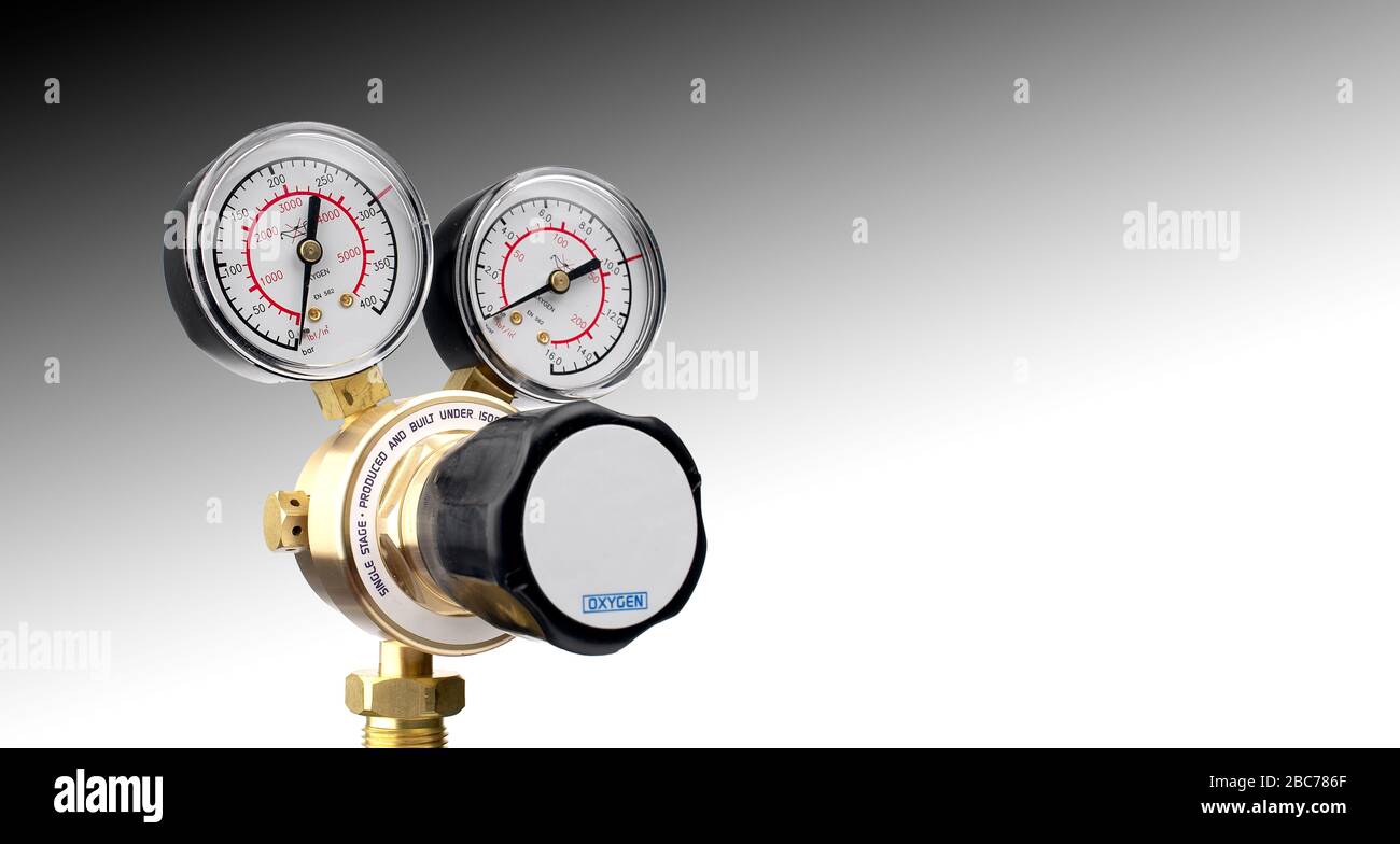 Cut out of oxygen regulator gauge on white background Stock Photo - Alamy