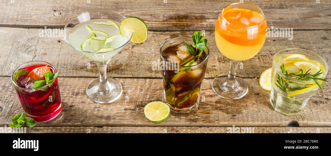 Selection of summer alcohol drinks - mocktails and cocktails. Aperol ...