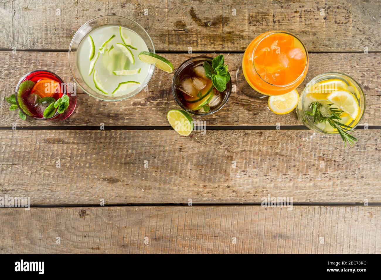 Selection of summer alcohol drinks - mocktails and cocktails. Aperol ...
