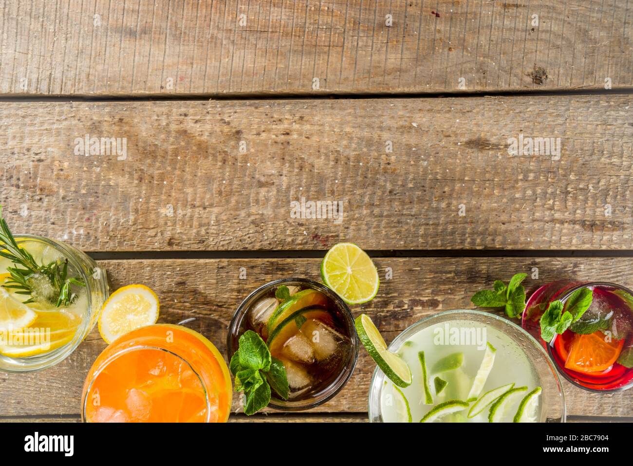 Selection of summer alcohol drinks - mocktails and cocktails. Aperol ...