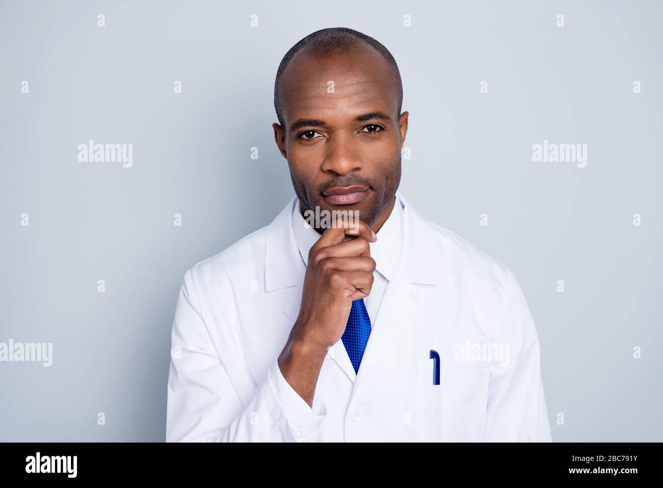 Photo of doctor handsome dark skin guy friendly smiling to patient ...