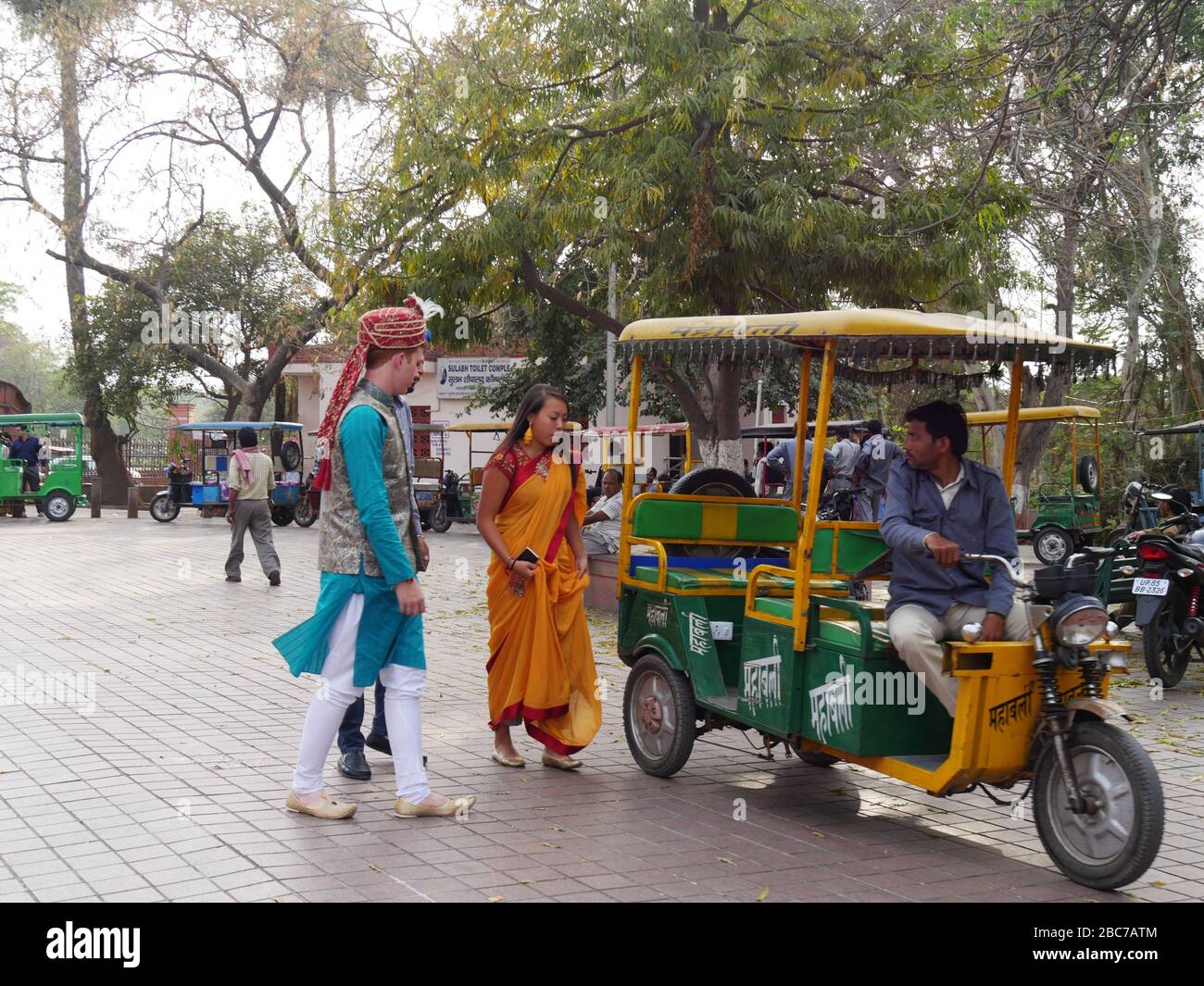 Agra, Uttar Pradesh, India- March 2018: A couple in colorful ...