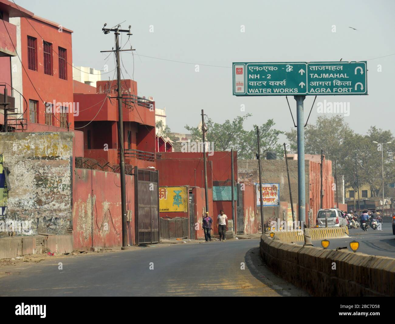 Agra, Uttar Pradesh, India- March 2018: Street view with directional ...